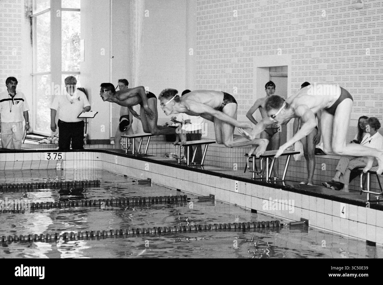 Swimmer starting blocks Black and White Stock Photos & Images - Alamy