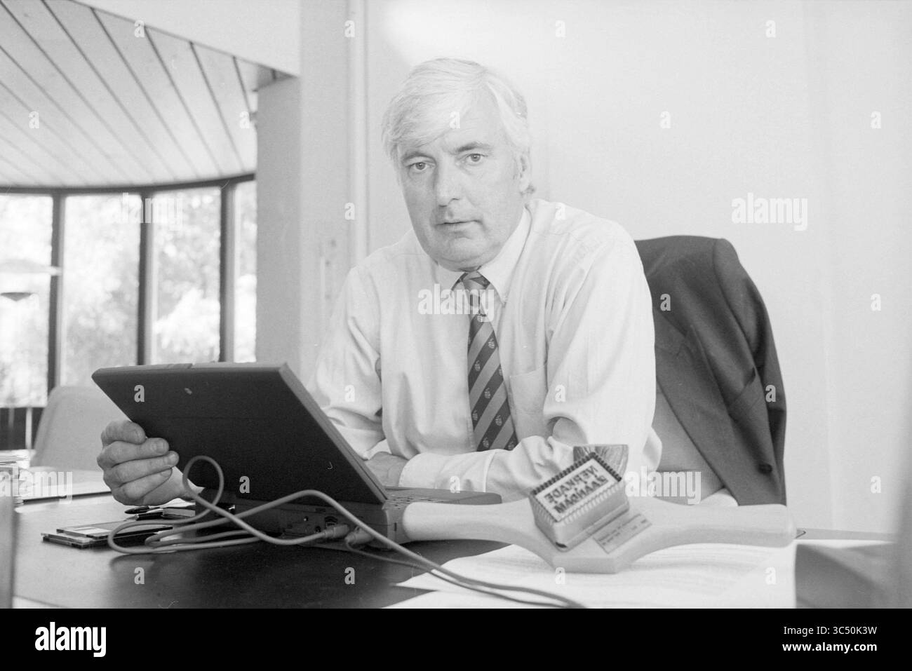 Tablet on desk in Black and White Stock Photos & Images - Alamy