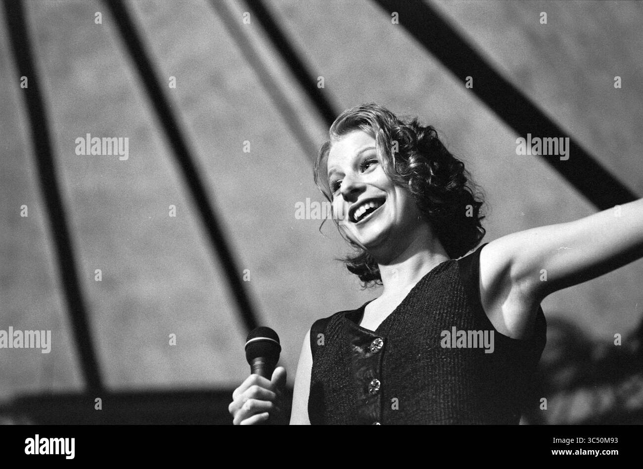 Cheerful performer stands hi-res stock photography and images - Alamy