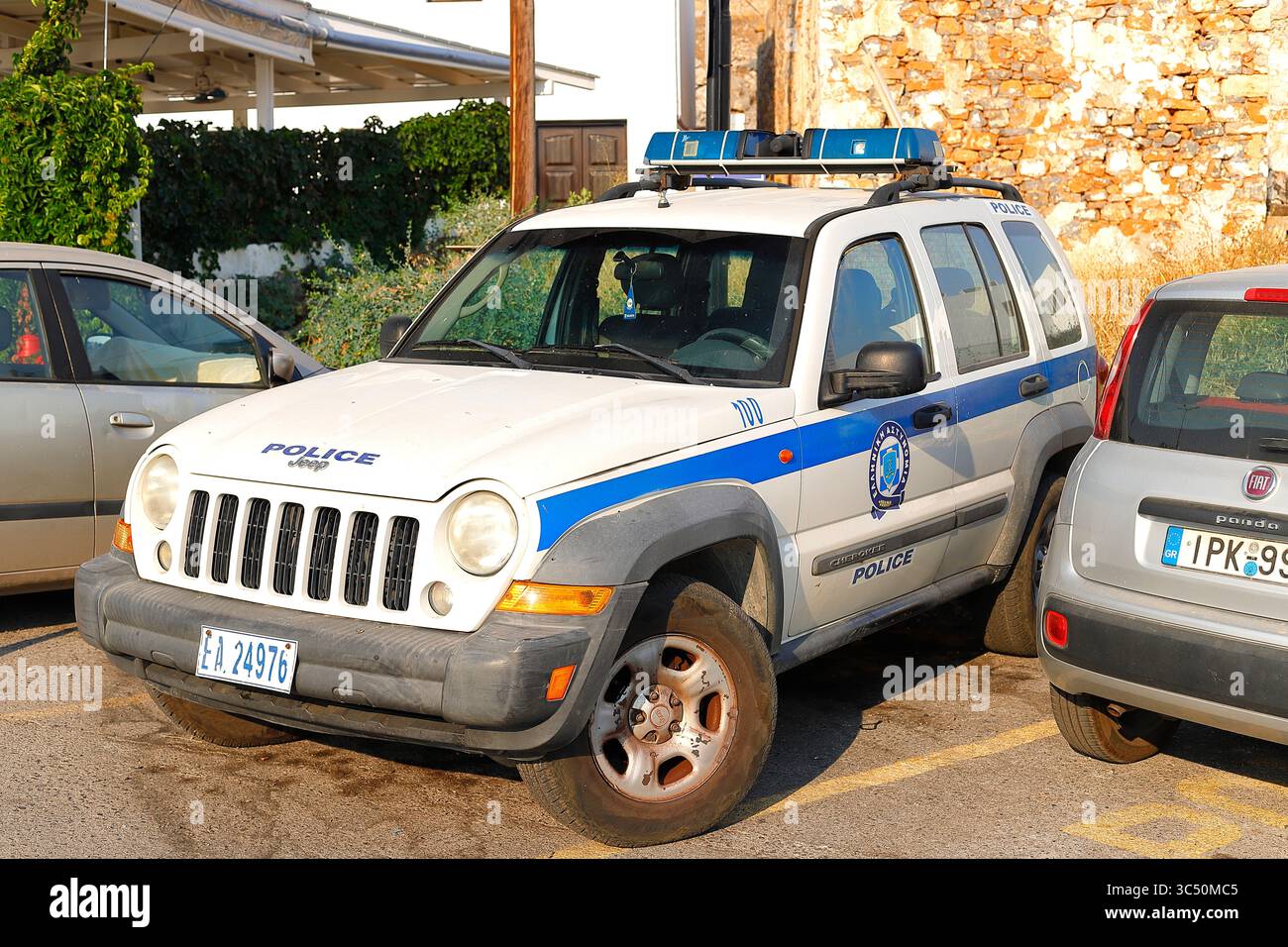 A Jeep Police vehicle in Lindos on the Greek island of Rhodes Stock ...