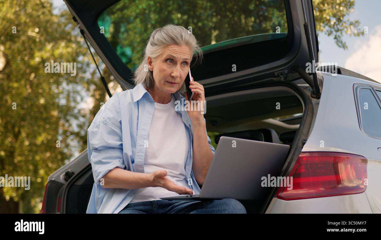 Angry irritated annoyed Caucasian mature elderly business woman female ...