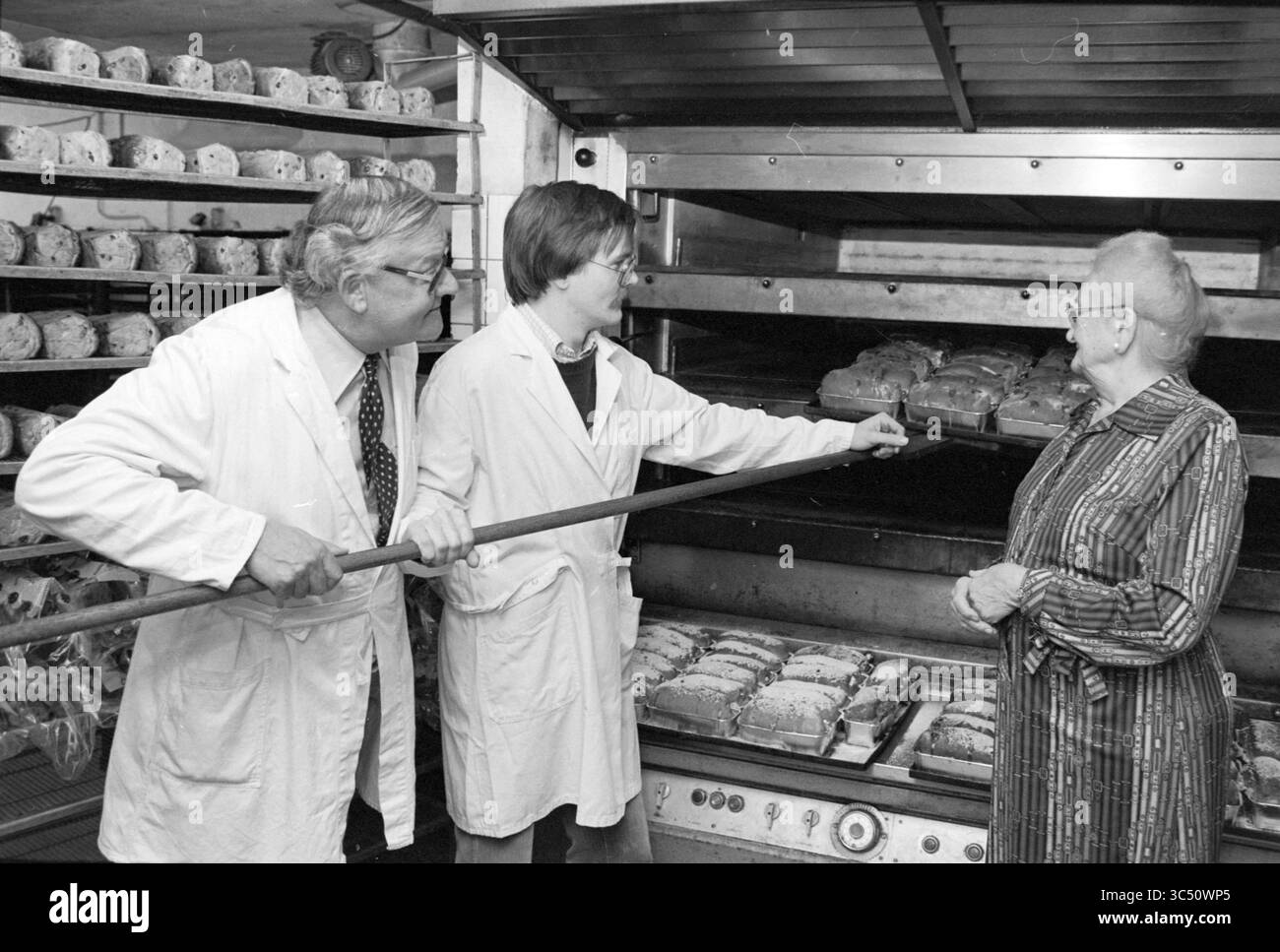 Community bread baking Black and White Stock Photos & Images - Alamy