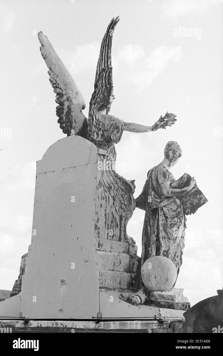 Winged figure stands Black and White Stock Photos & Images - Alamy