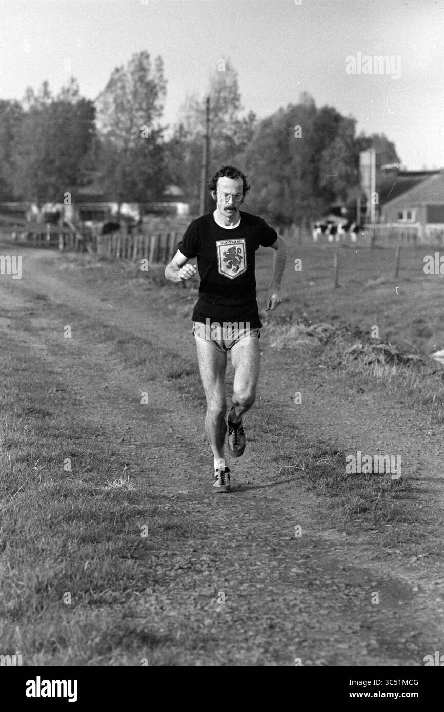 Man running dirt path Black and White Stock Photos & Images - Alamy