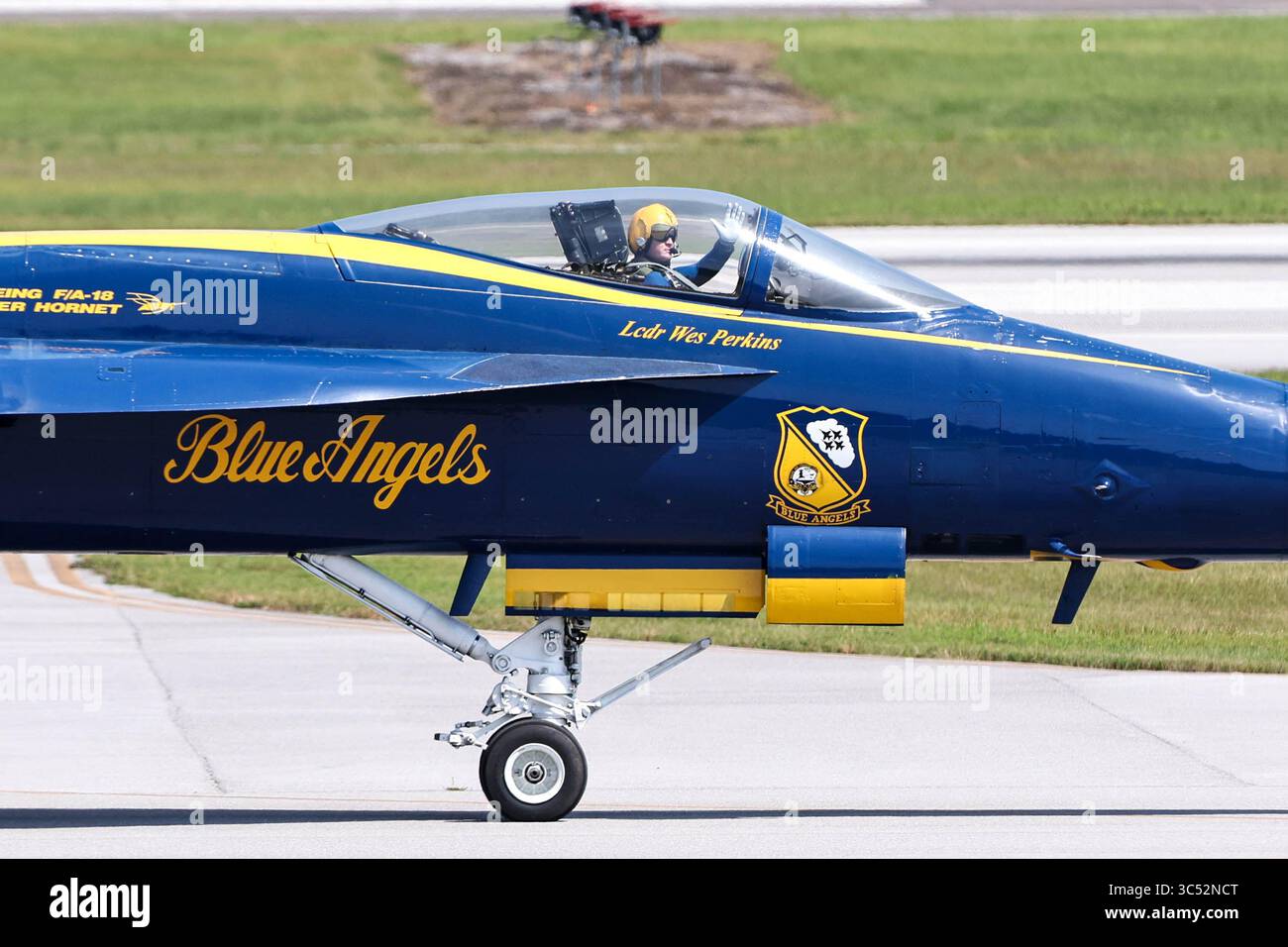 July 29, 2025: Lieutenant Commander James Wesley Perkins waves to the ...