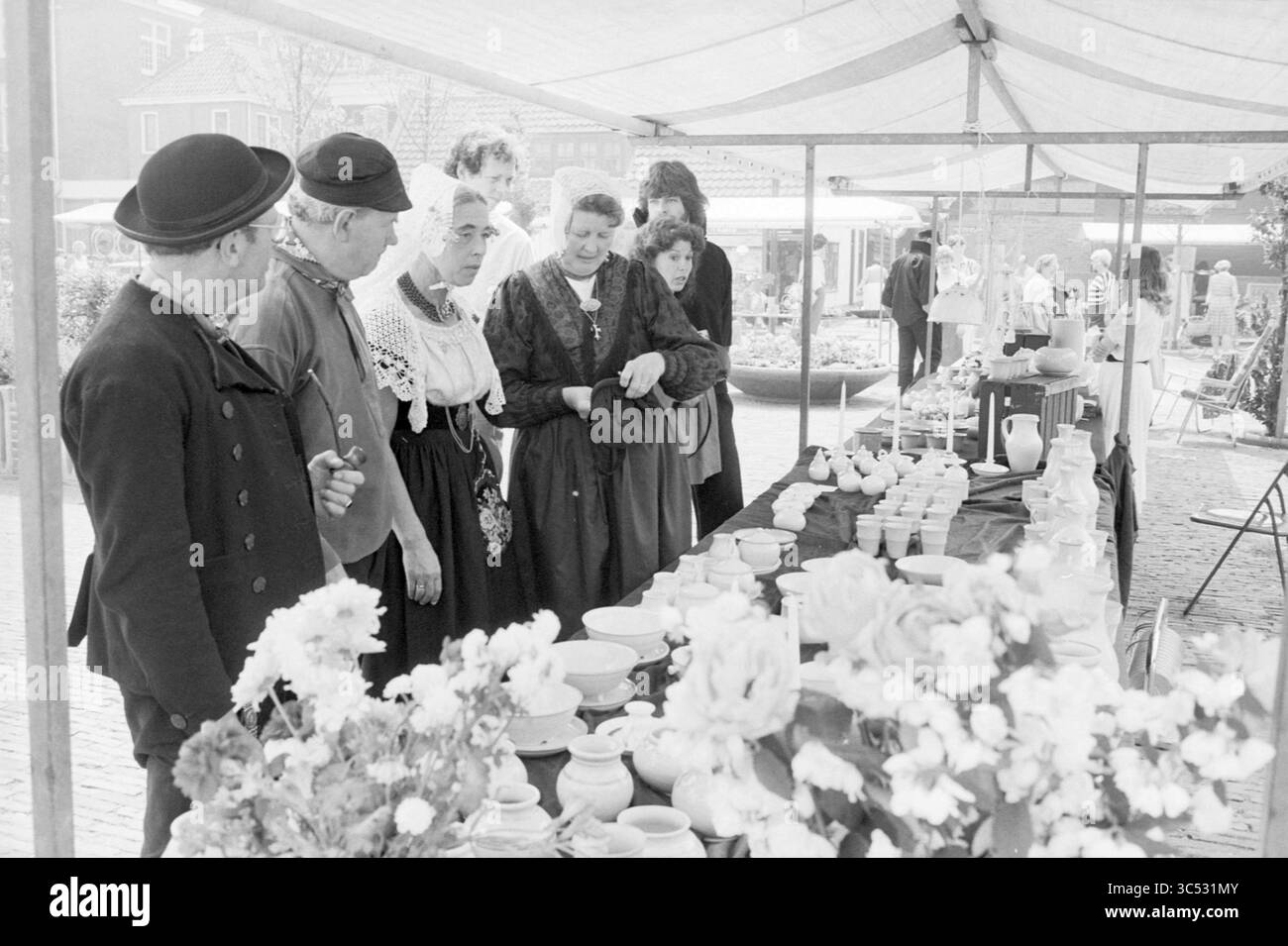 Market stall with pottery Black and White Stock Photos & Images - Alamy