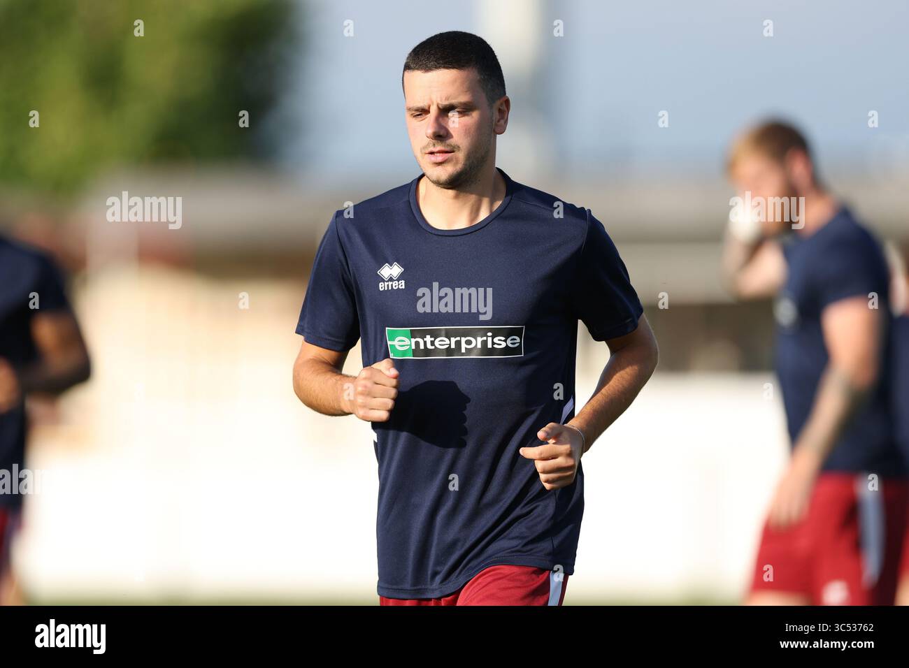 Josh Castiglione of Chelmsford City seen warming up prior to the match ...
