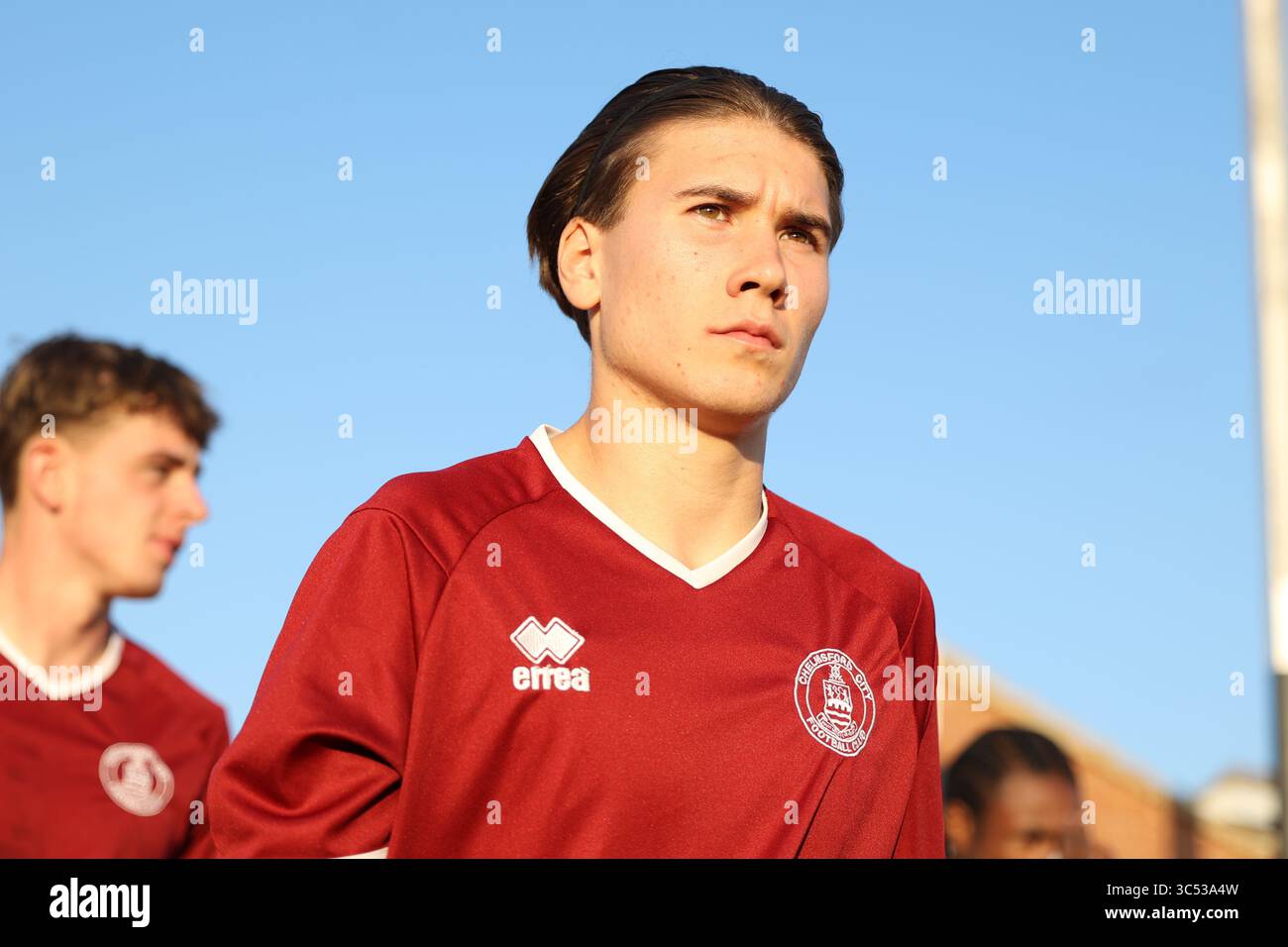 Jett Murphy of Chelmsford City Pathway walking into the pitch before ...