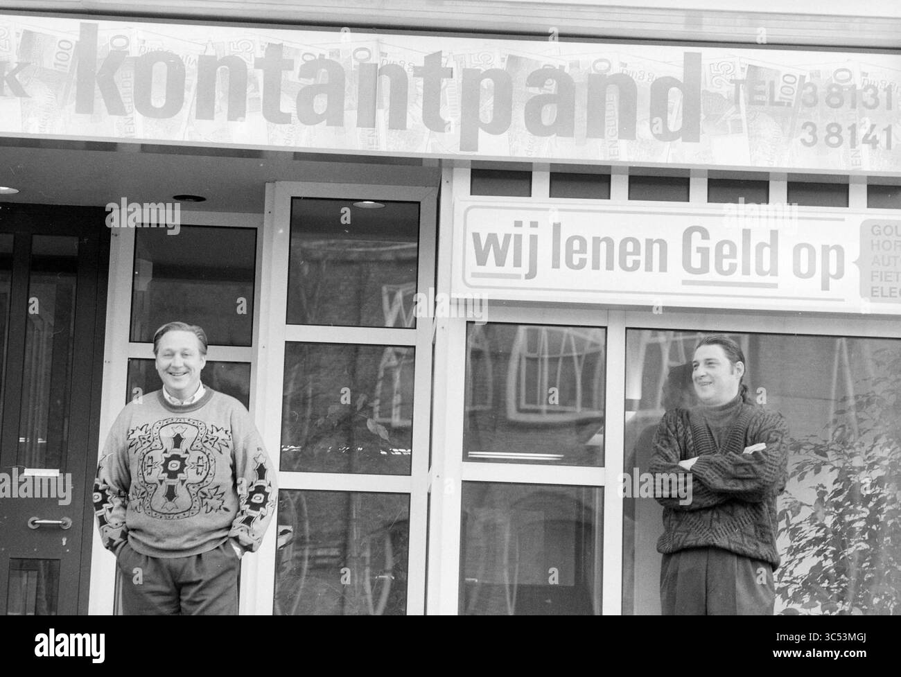 Stand outside the shop Black and White Stock Photos & Images - Alamy