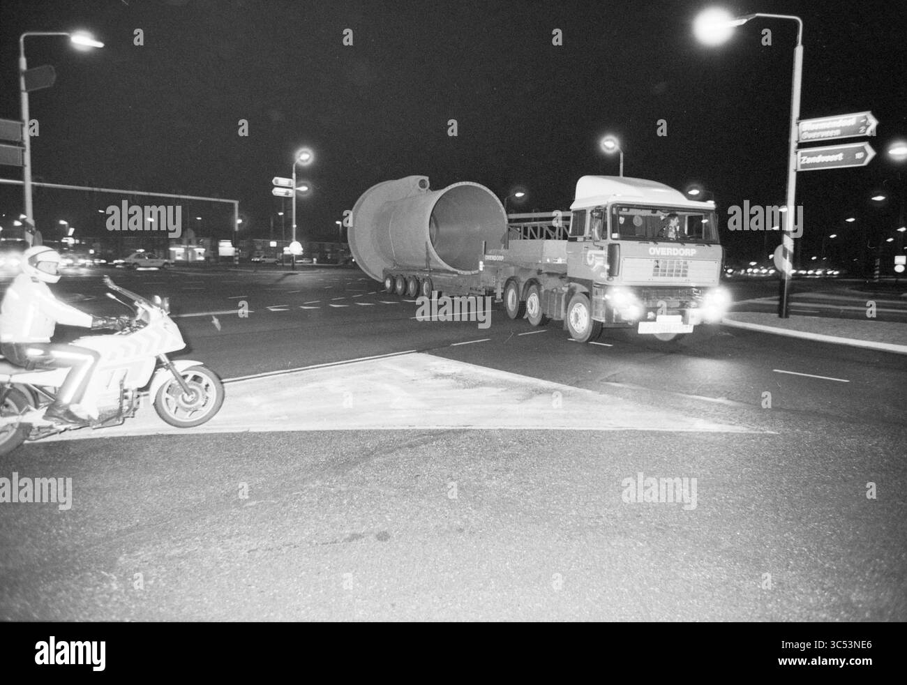 Oversized concrete cylinder navigates hi-res stock photography and ...