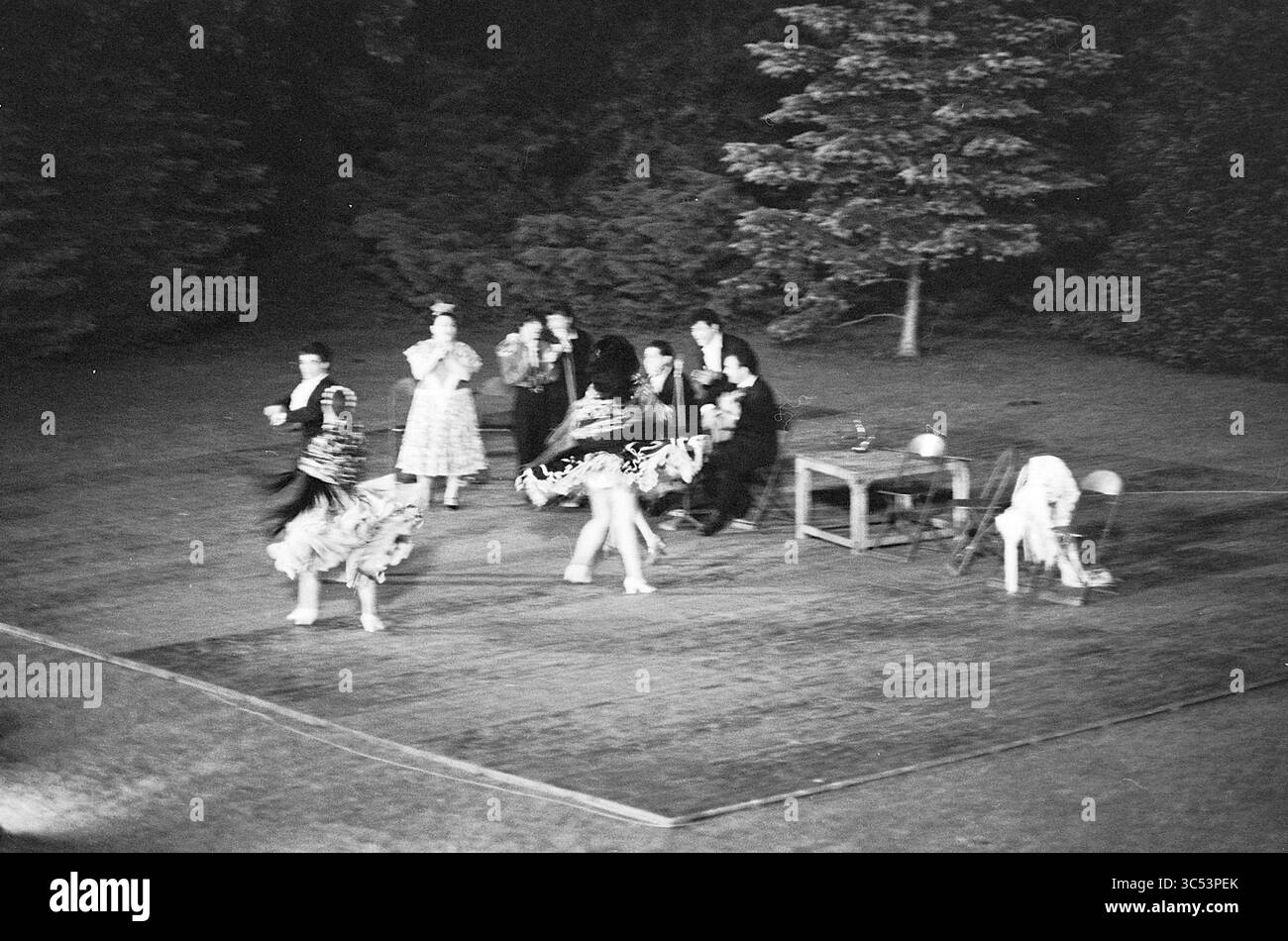 Seated spectators enjoy hi-res stock photography and images - Alamy