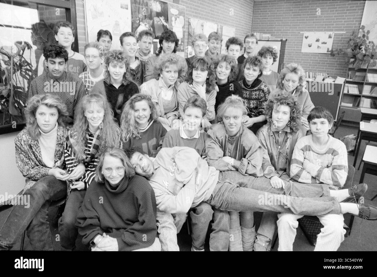 Seated lean Black and White Stock Photos & Images - Alamy