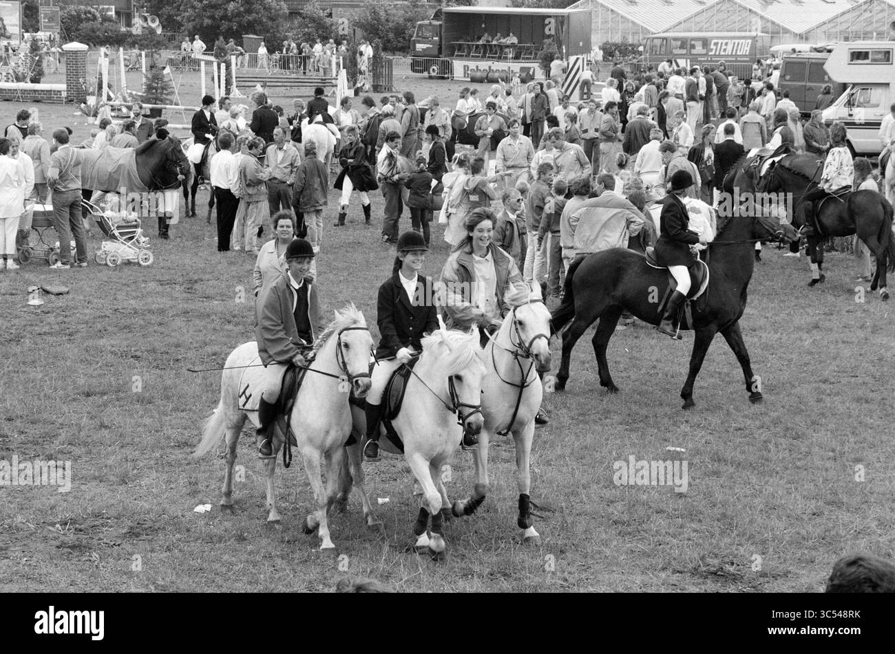 Equestrian attire gracefully guiding hi-res stock photography and ...