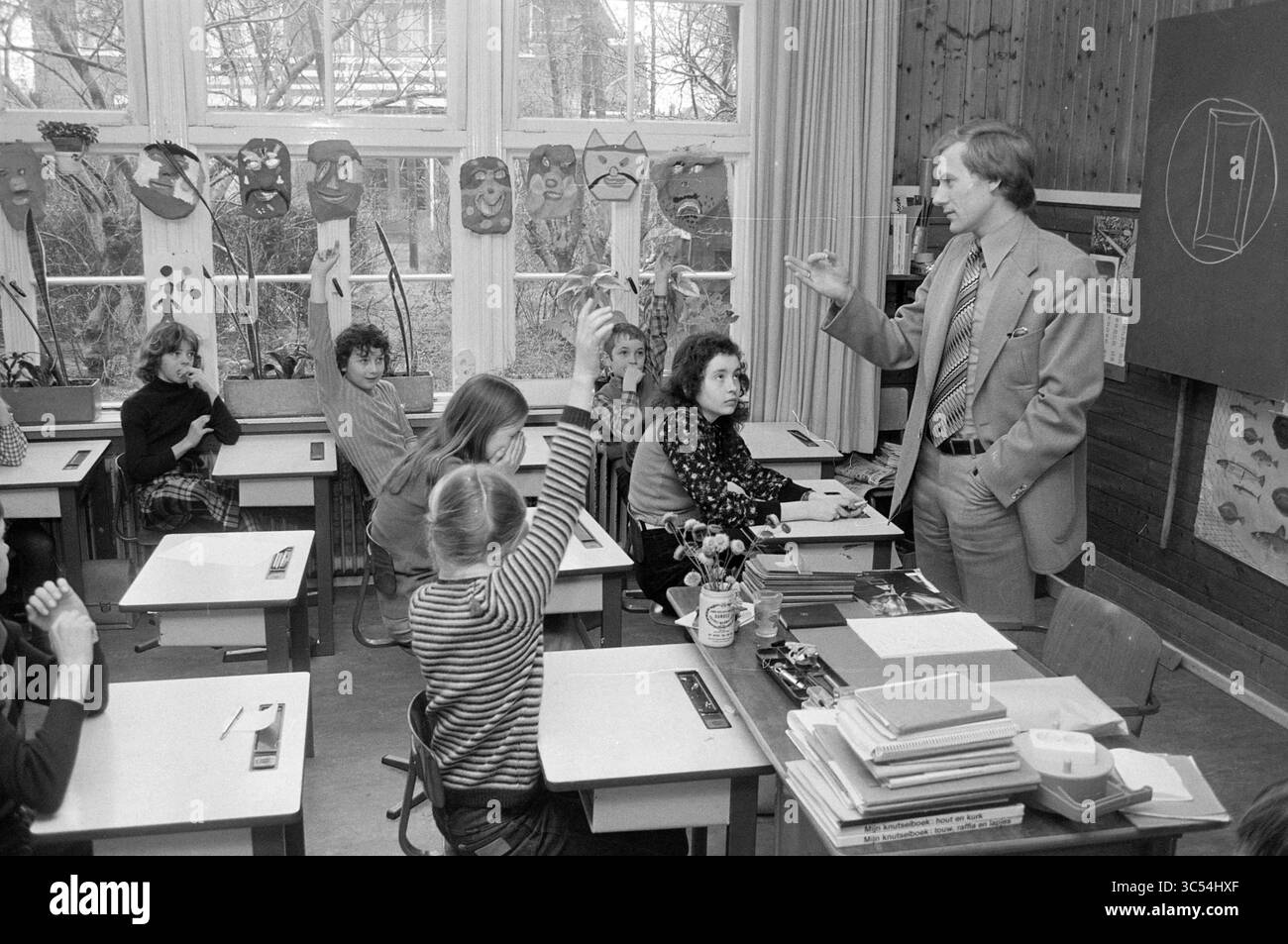 Children raising hands class Black and White Stock Photos & Images - Alamy
