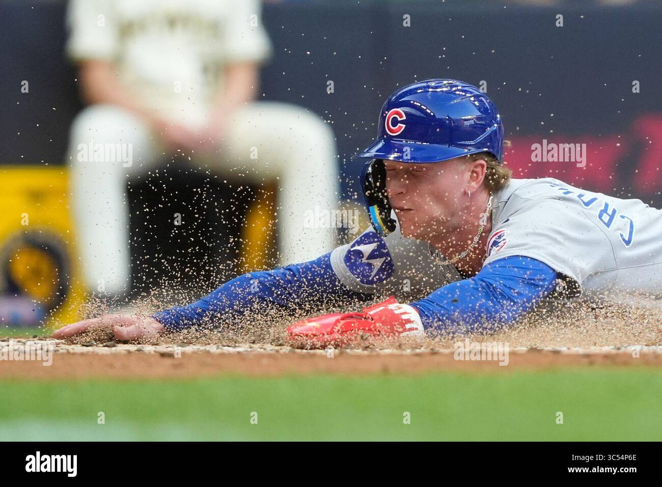 Chicago Cubs' Pete Crow-Armstrong slides home to score a run during the ...