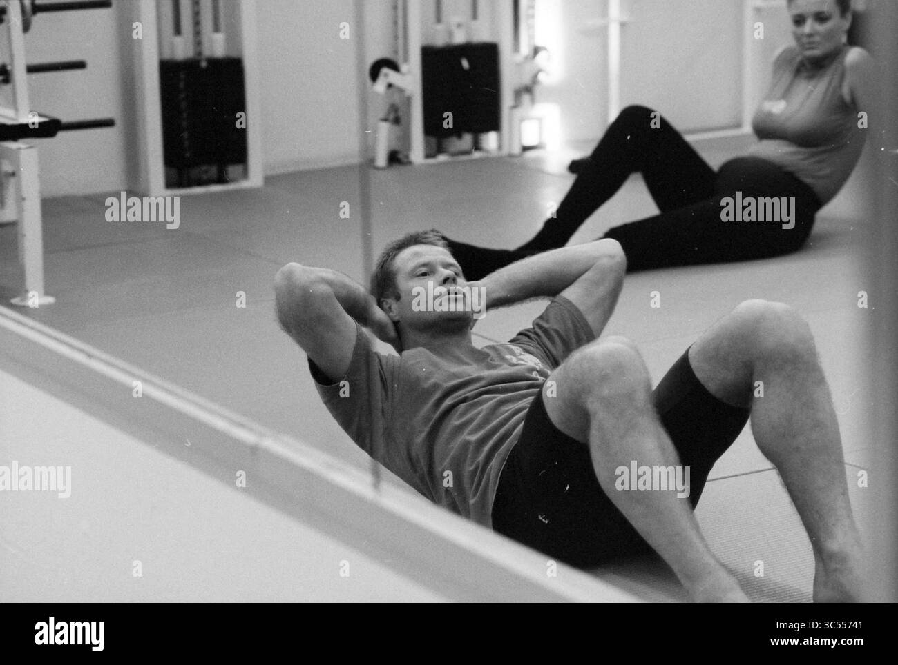 Man seated desk focused on Black and White Stock Photos & Images - Alamy