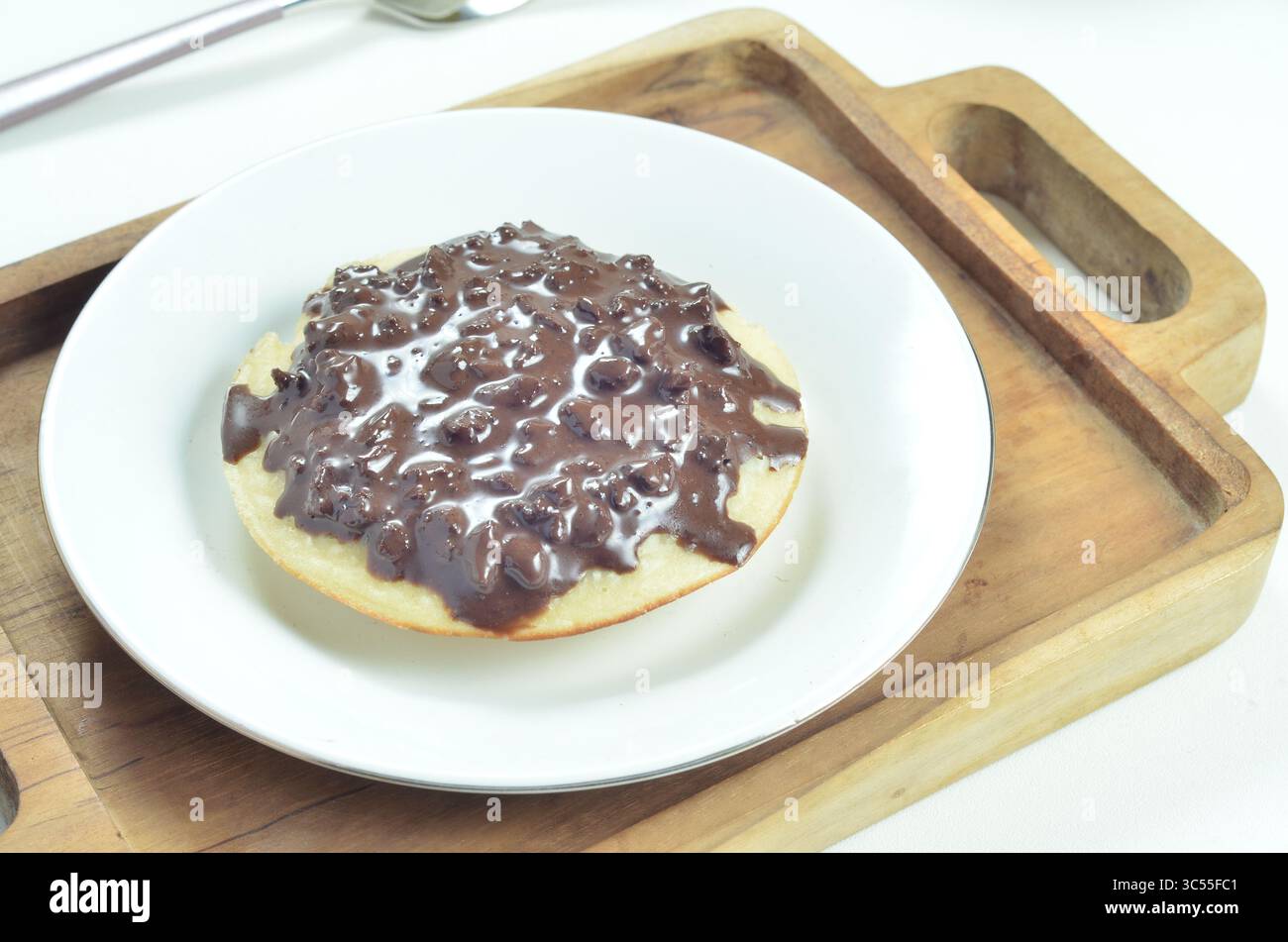 Serabi pancake with chocolate jam topping, a traditional Indonesian ...