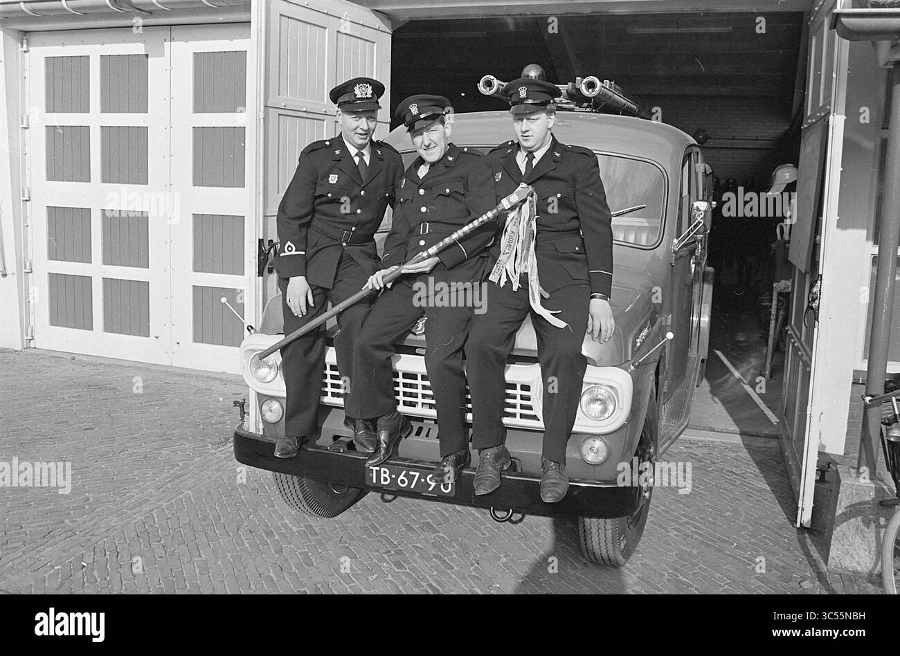 Three firefighters on fire truck Whizgle News, Dutch Desk, The ...