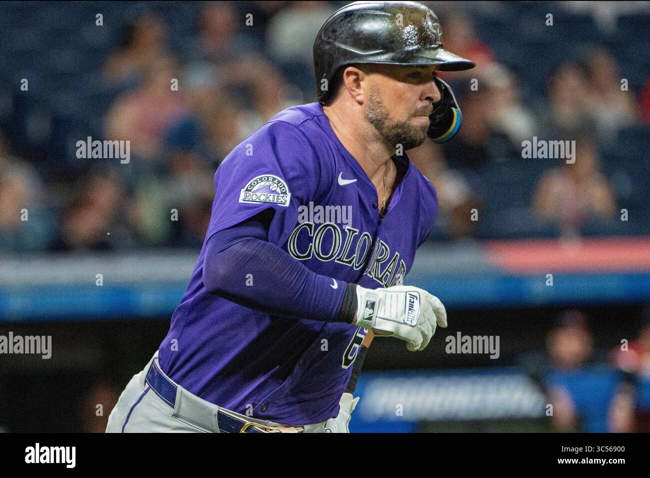 Colorado Rockies' Kyle Farmer rounds the bases after hitting a solo ...
