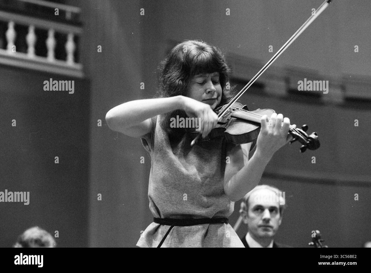 playing violin while singing