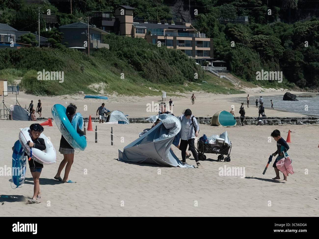 A tsunami warning was issued, and beachgoers packed up their belongings ...