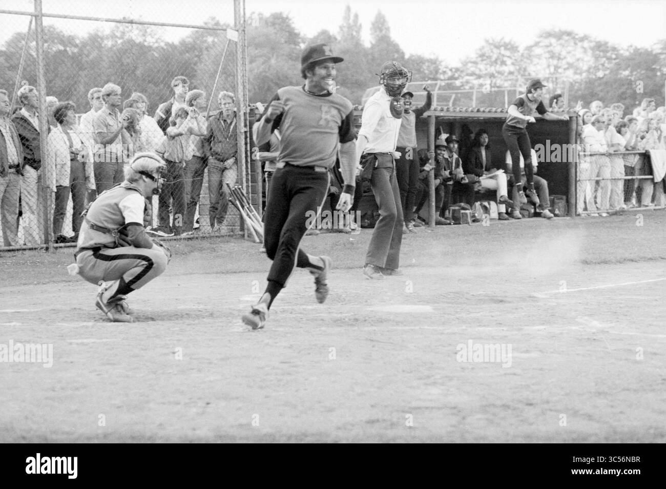 Gathered behind plate hi-res stock photography and images - Alamy