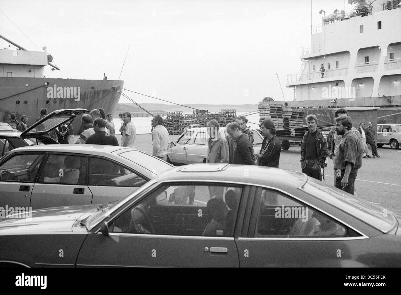 Cargo ship people in port Black and White Stock Photos & Images - Alamy