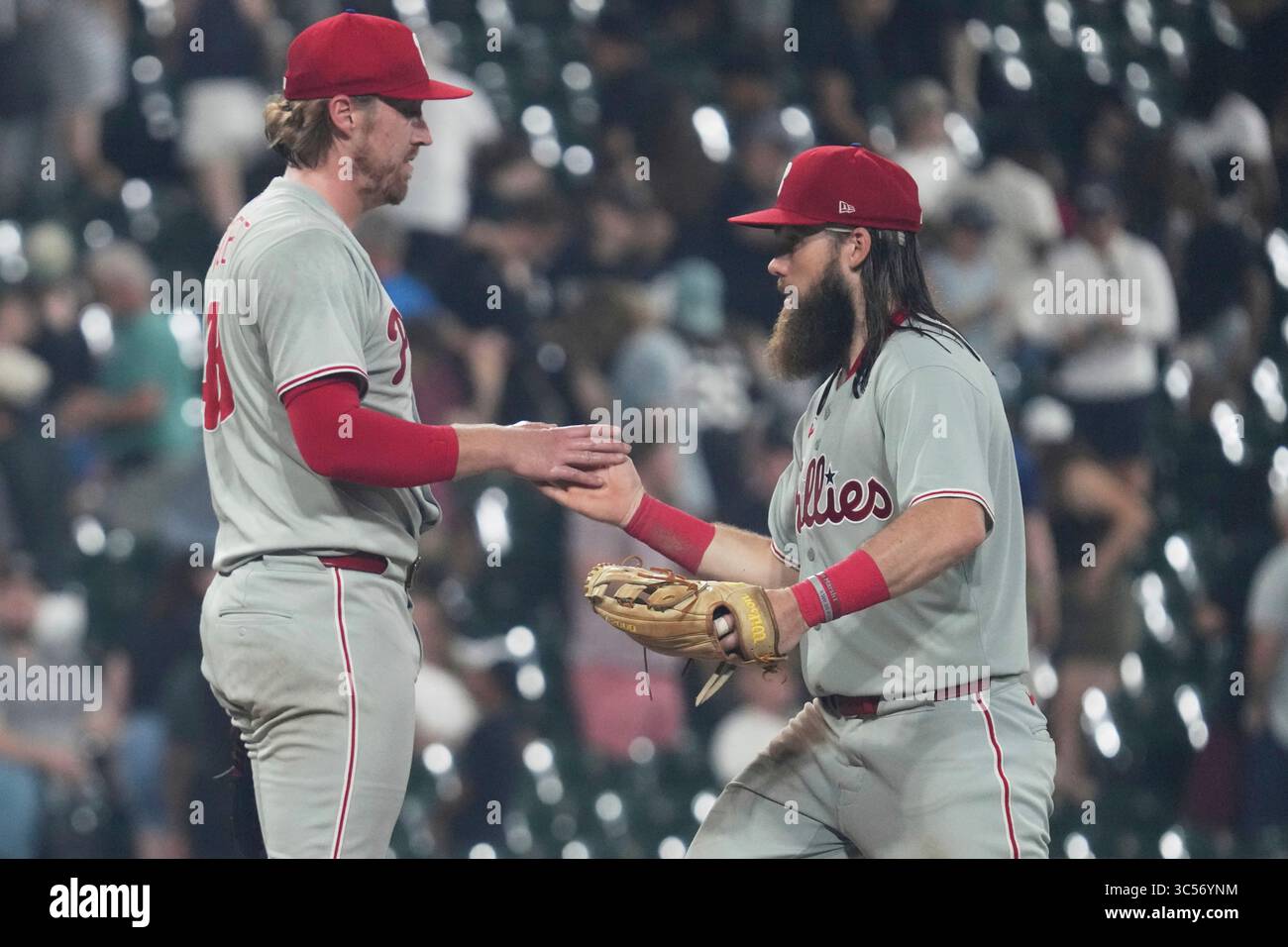 Philadelphia Phillies relief pitcher Daniel Robert, left, celebrates ...