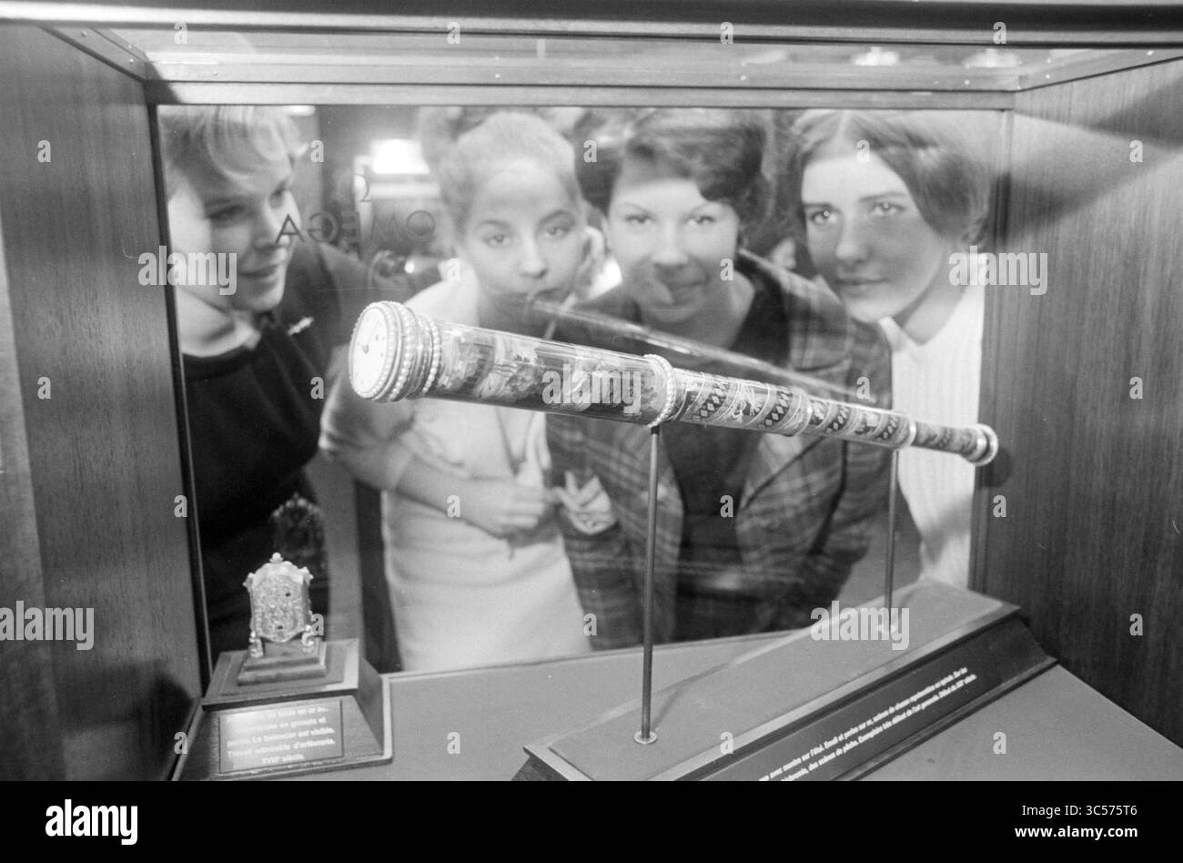 Women observe Black and White Stock Photos & Images - Alamy