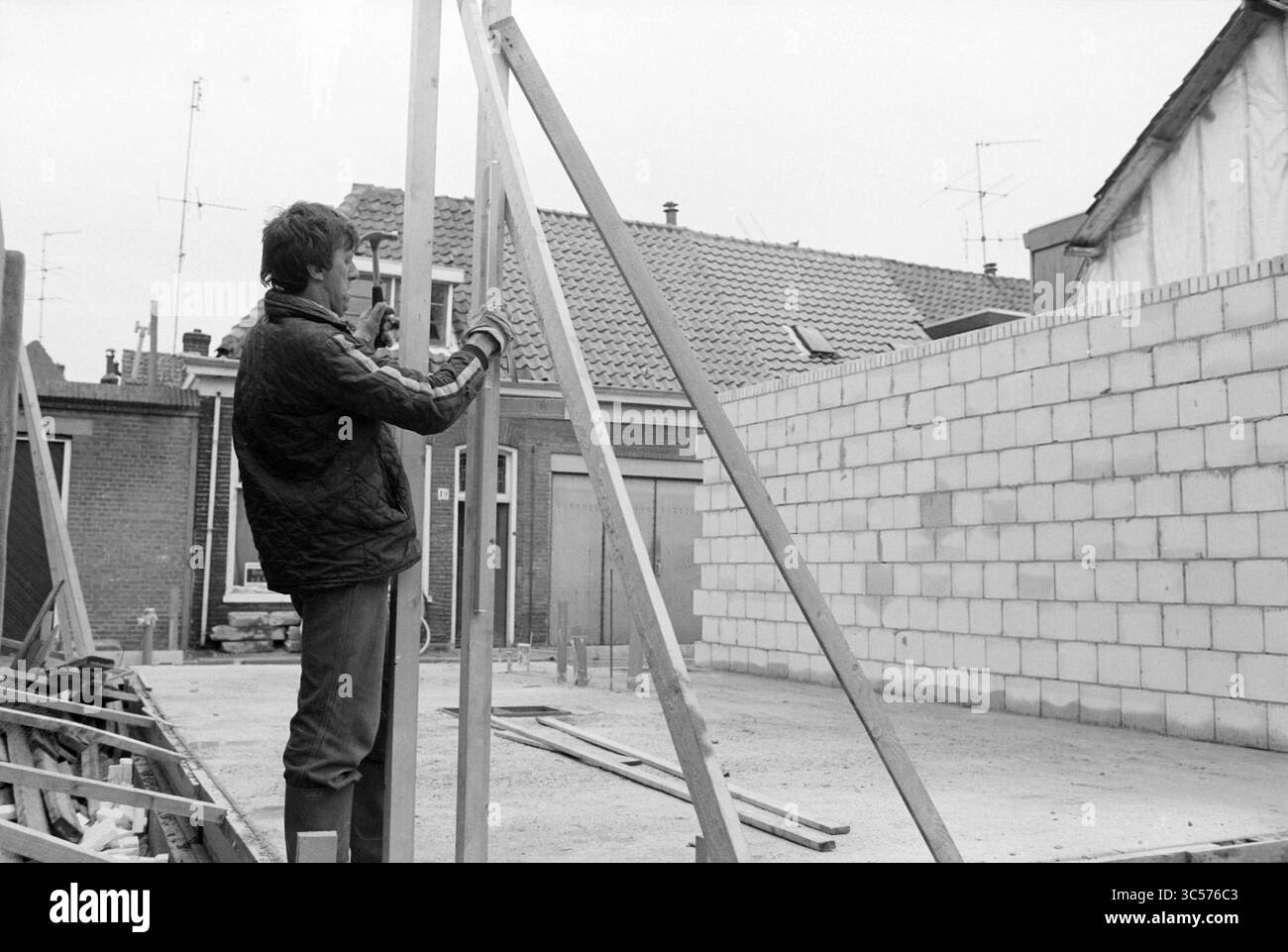 Building site measuring Black and White Stock Photos & Images - Alamy