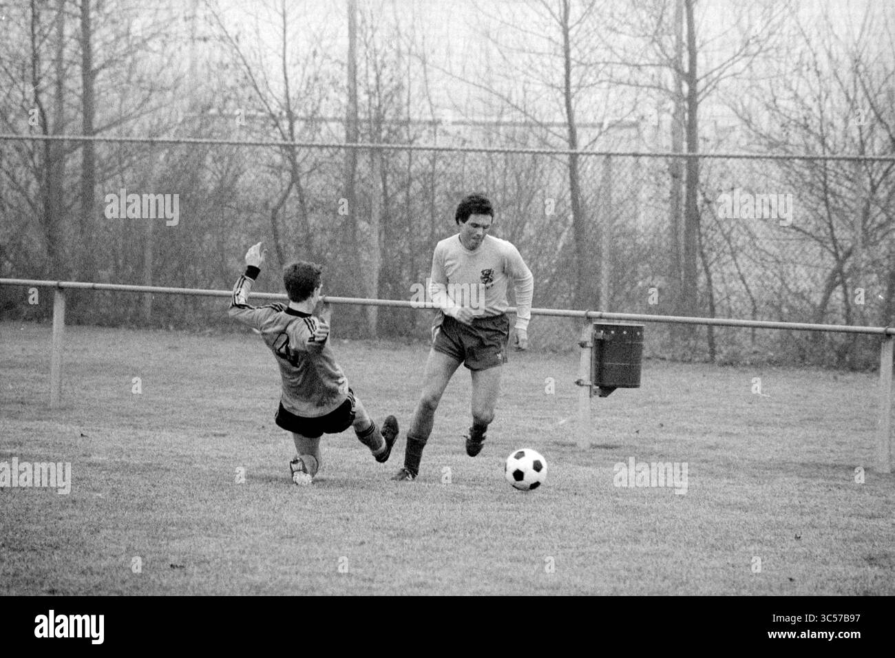 Soccer ball on grassy Black and White Stock Photos & Images - Alamy