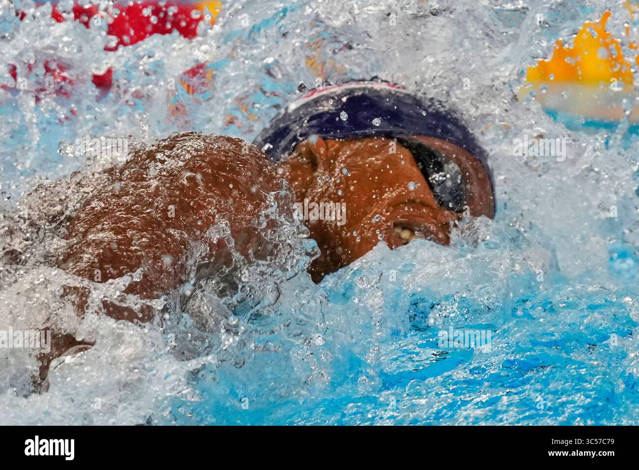 Phone Pyae Han of Myanmar competes in the men's 100-meter freestyle ...