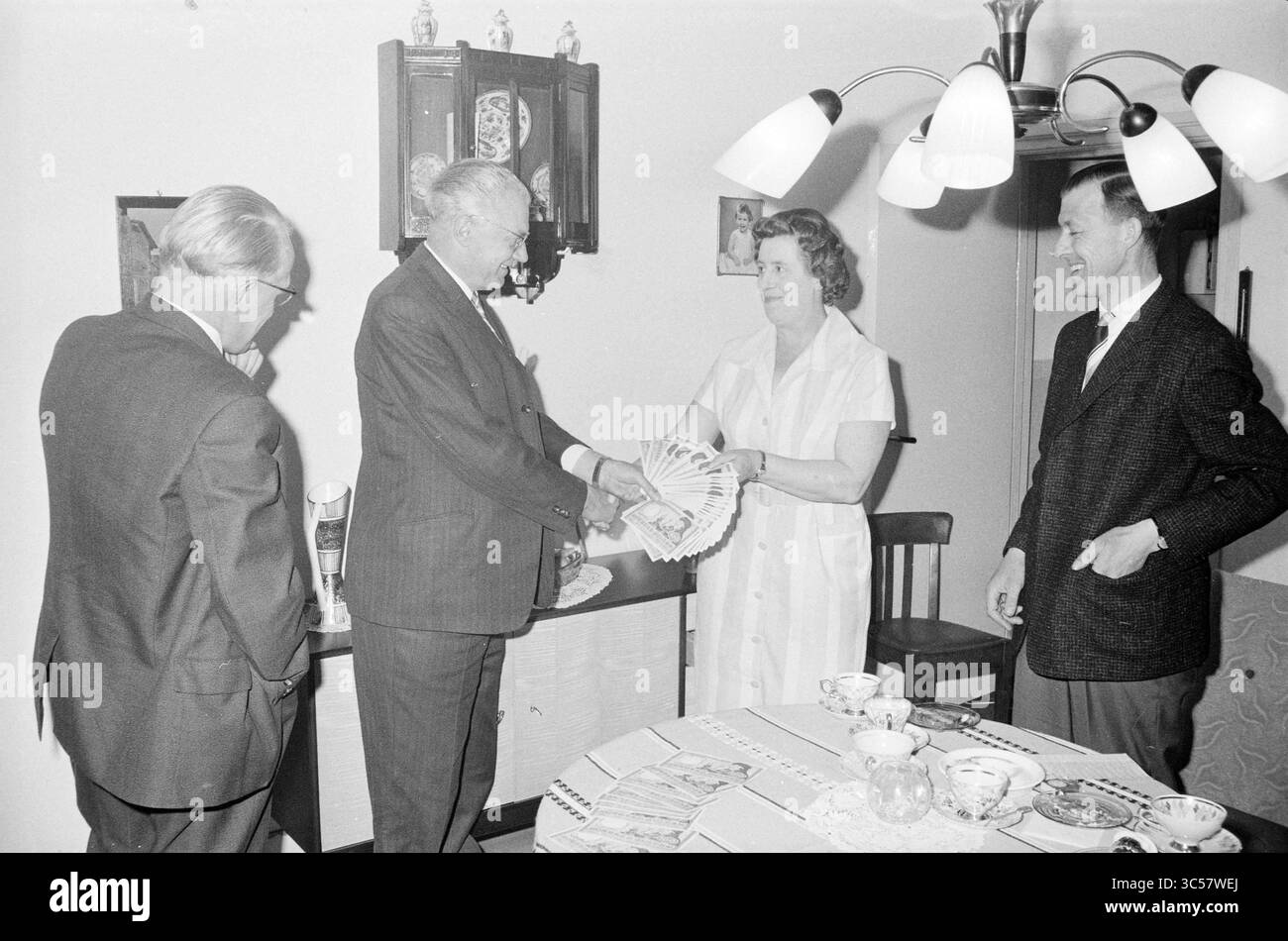 Business woman handing card Black and White Stock Photos & Images - Alamy