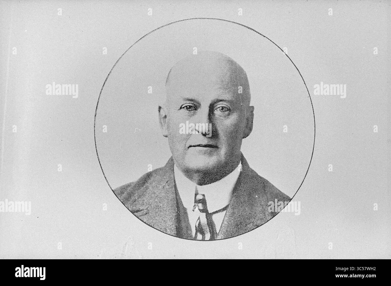 Bald man dressed in Black and White Stock Photos & Images - Alamy