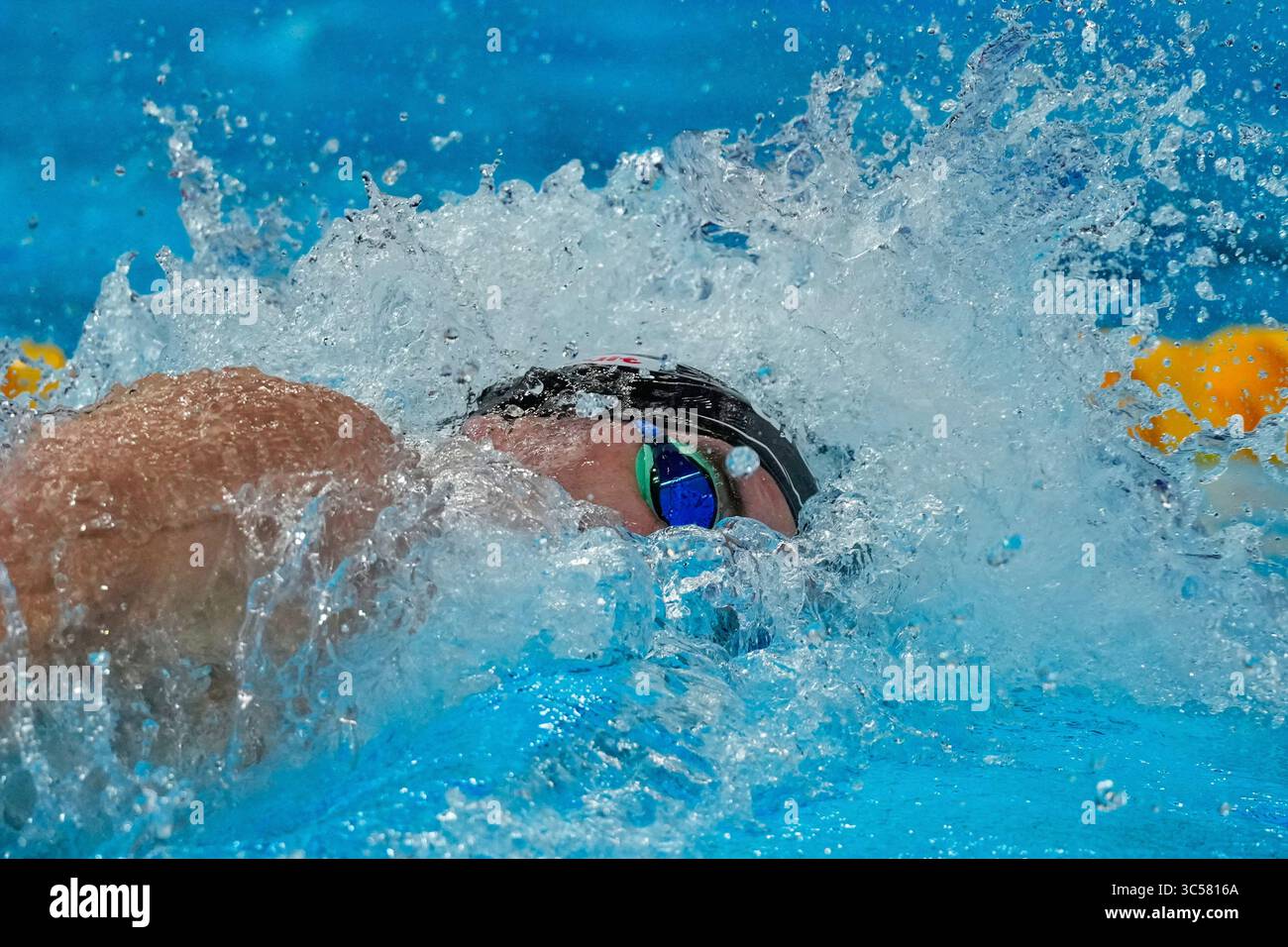 Evan Bailey of Ireland competes in the men's 100-meter freestyle heats ...