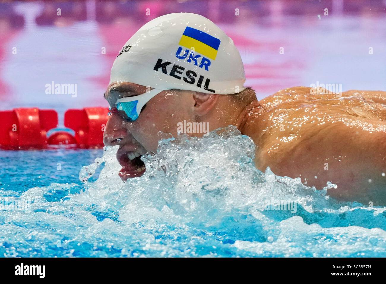 Denys Kesil of Ukraine competes in the men's 200-meter individual ...