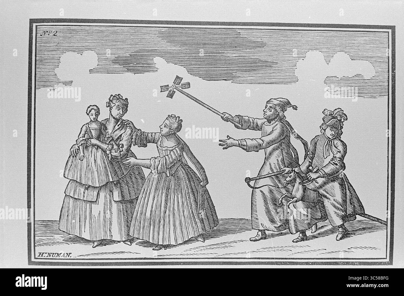 Elaborate historical attire interact hi-res stock photography and ...