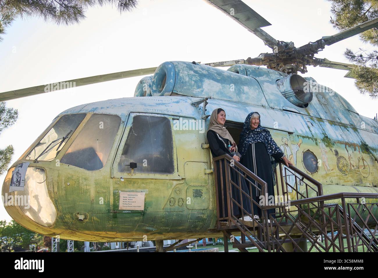 Afghan tour guide Somaya Moniry, 24, left, and 82-year-old Australian tourist Suzanne Sandral ...