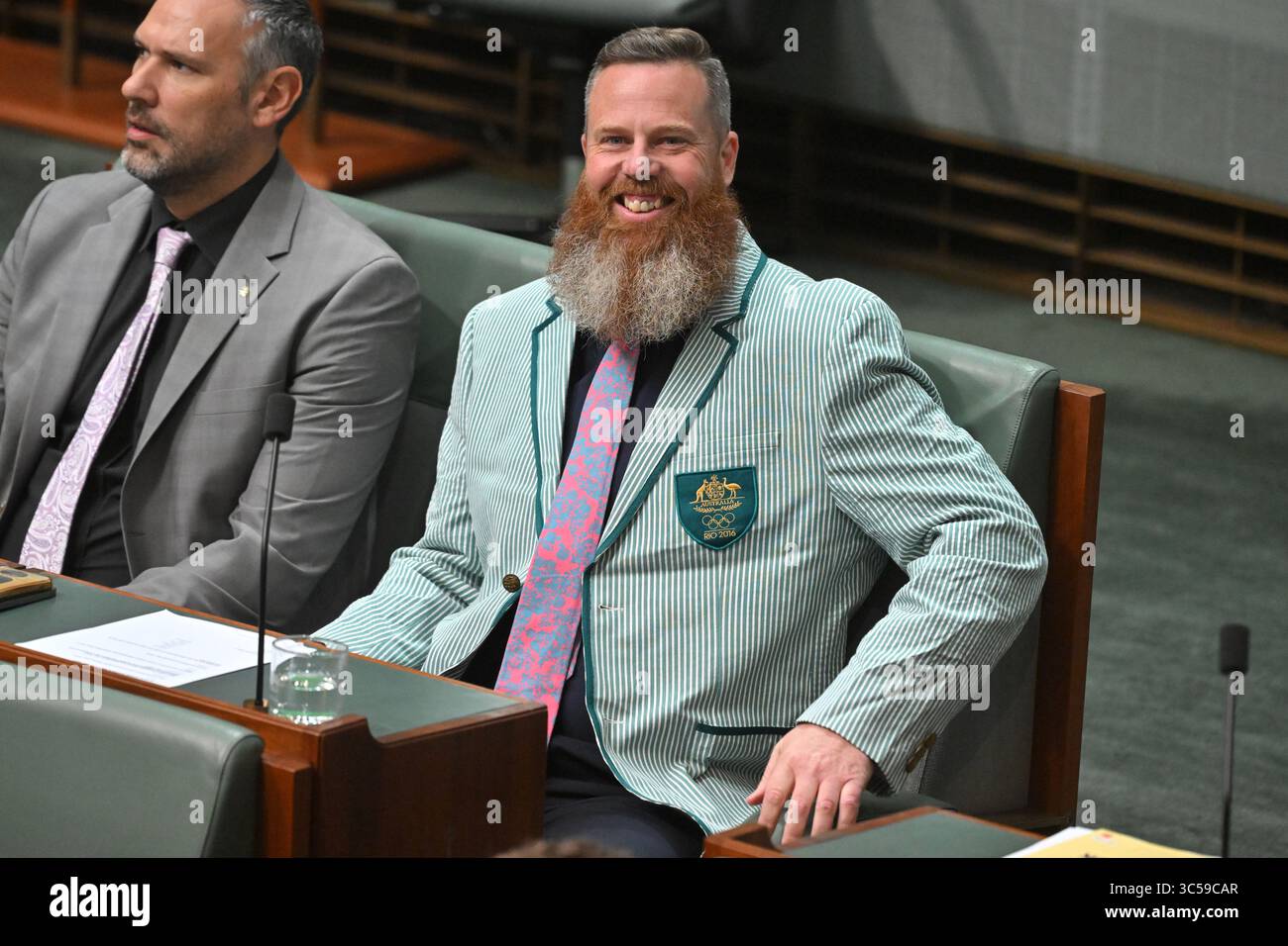 Labor member for Hunter Dan Repacholi wears his Olympic jacket during ...