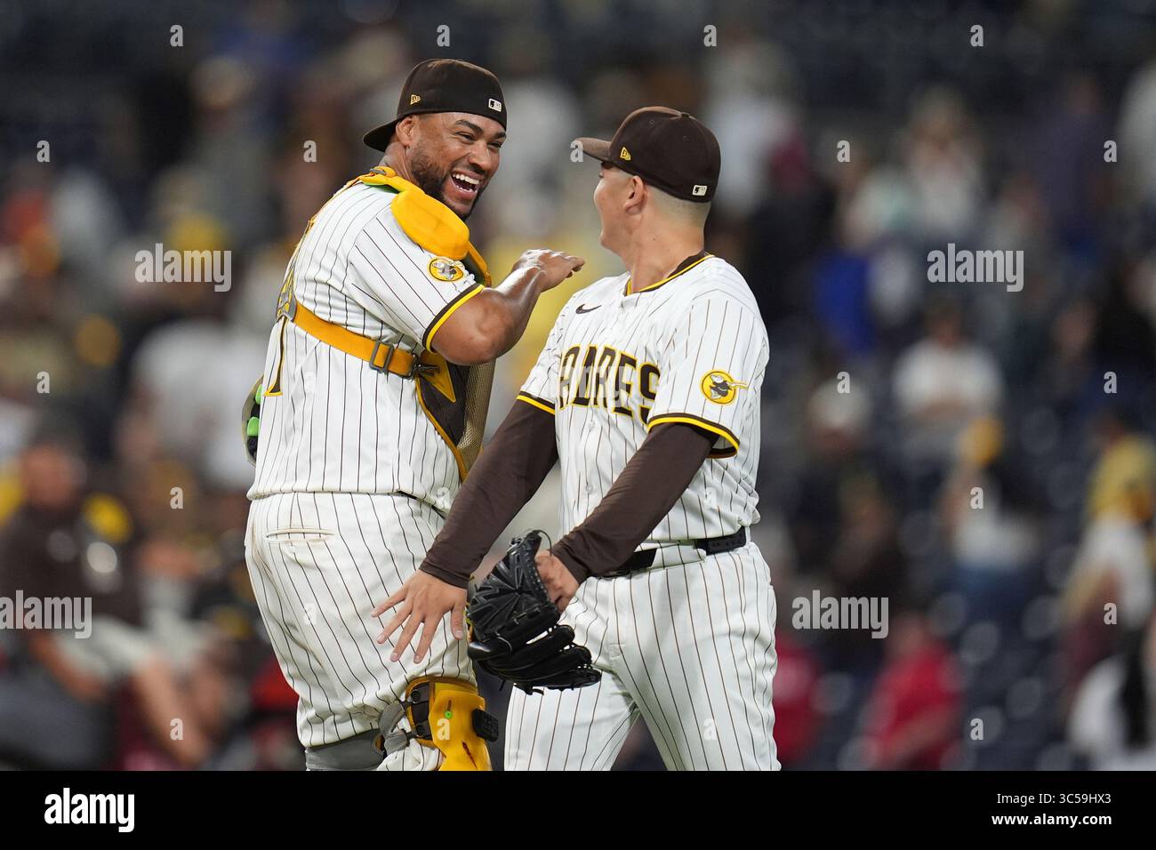 San Diego Padres relief pitcher Yuki Matsui, right, celebrates with ...