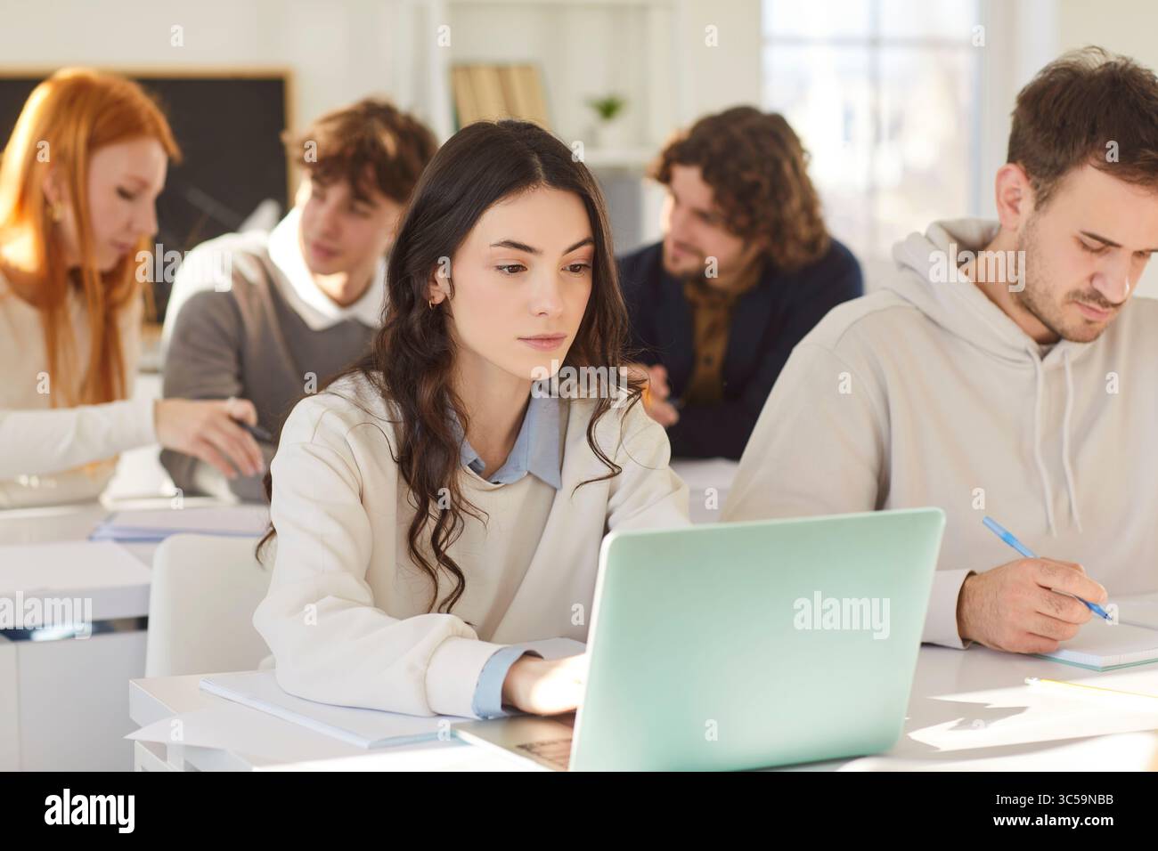 Young students community laptop elearning hi-res stock photography and ...