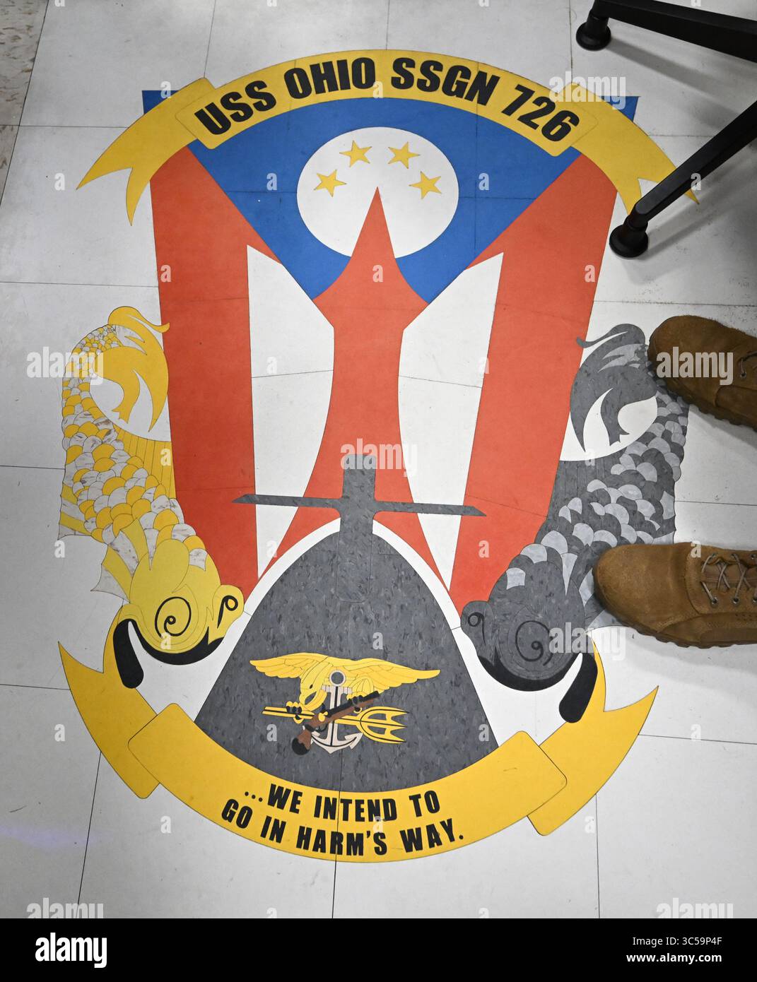 The logo of the USS Ohio is seen on the floor of the captain’s state ...