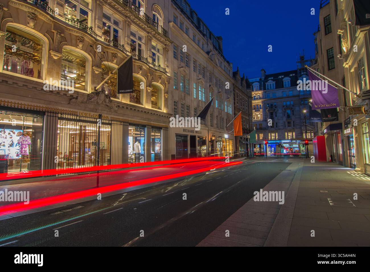 Old Bond Street at night with traffic light trails, Mayfair, London ...