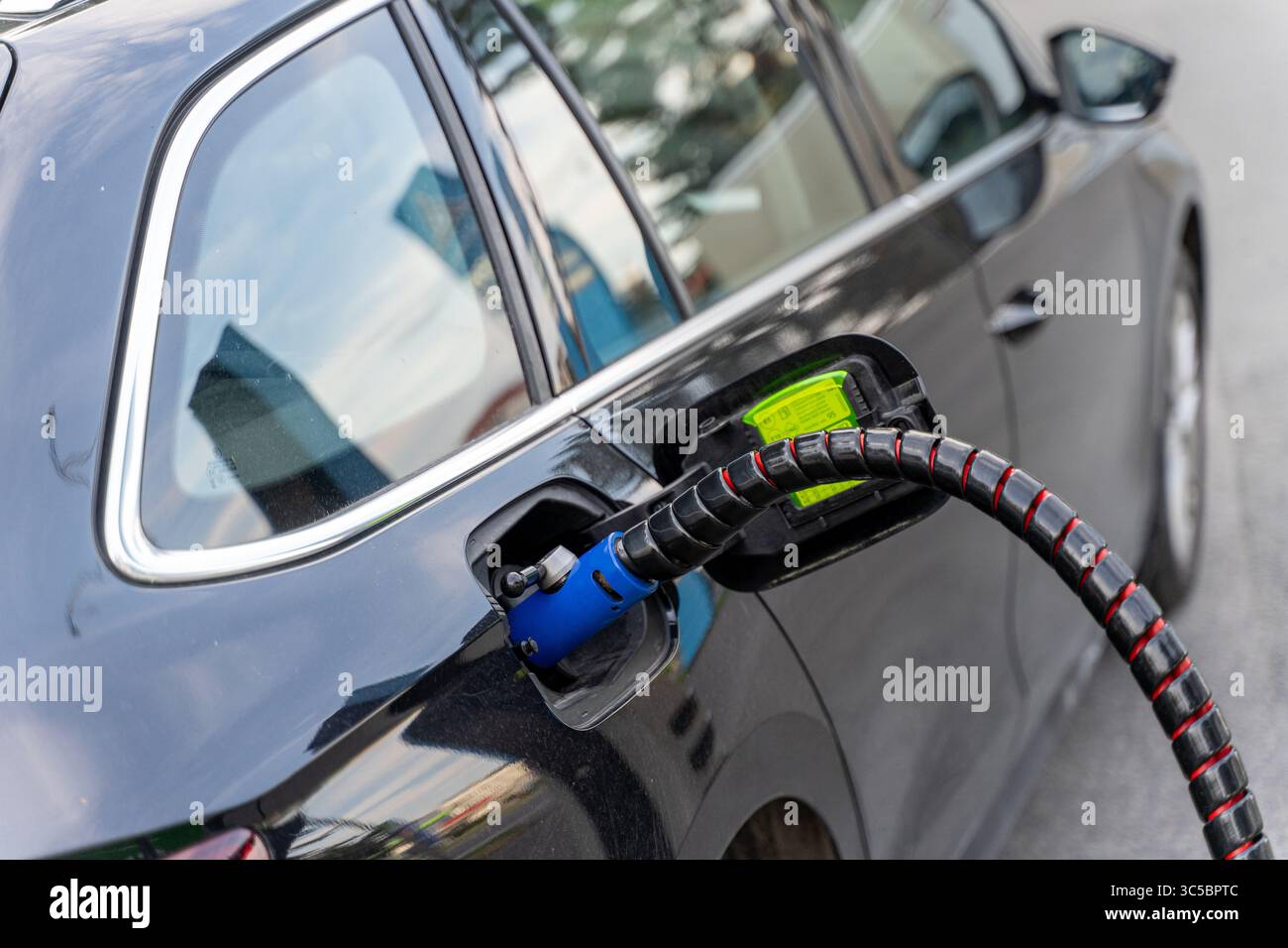 Refueling a vehicle with compressed natural gas (CNG) at a fueling ...