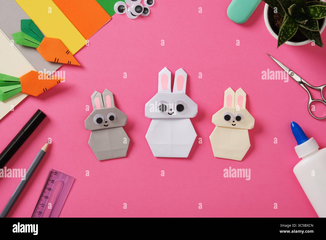 Origami paper crafts white bunnies looking at each other. Idea of ...