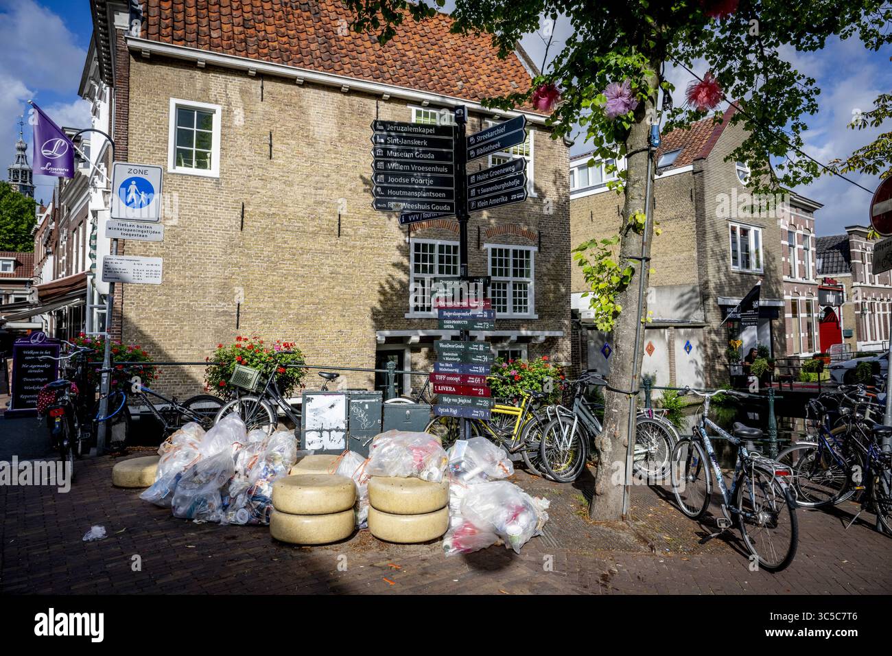 GOUDA - Garbage bags in a residential area with separated trash in ...