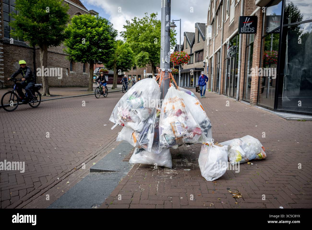 GOUDA - Garbage bags in a residential area with separated trash in ...