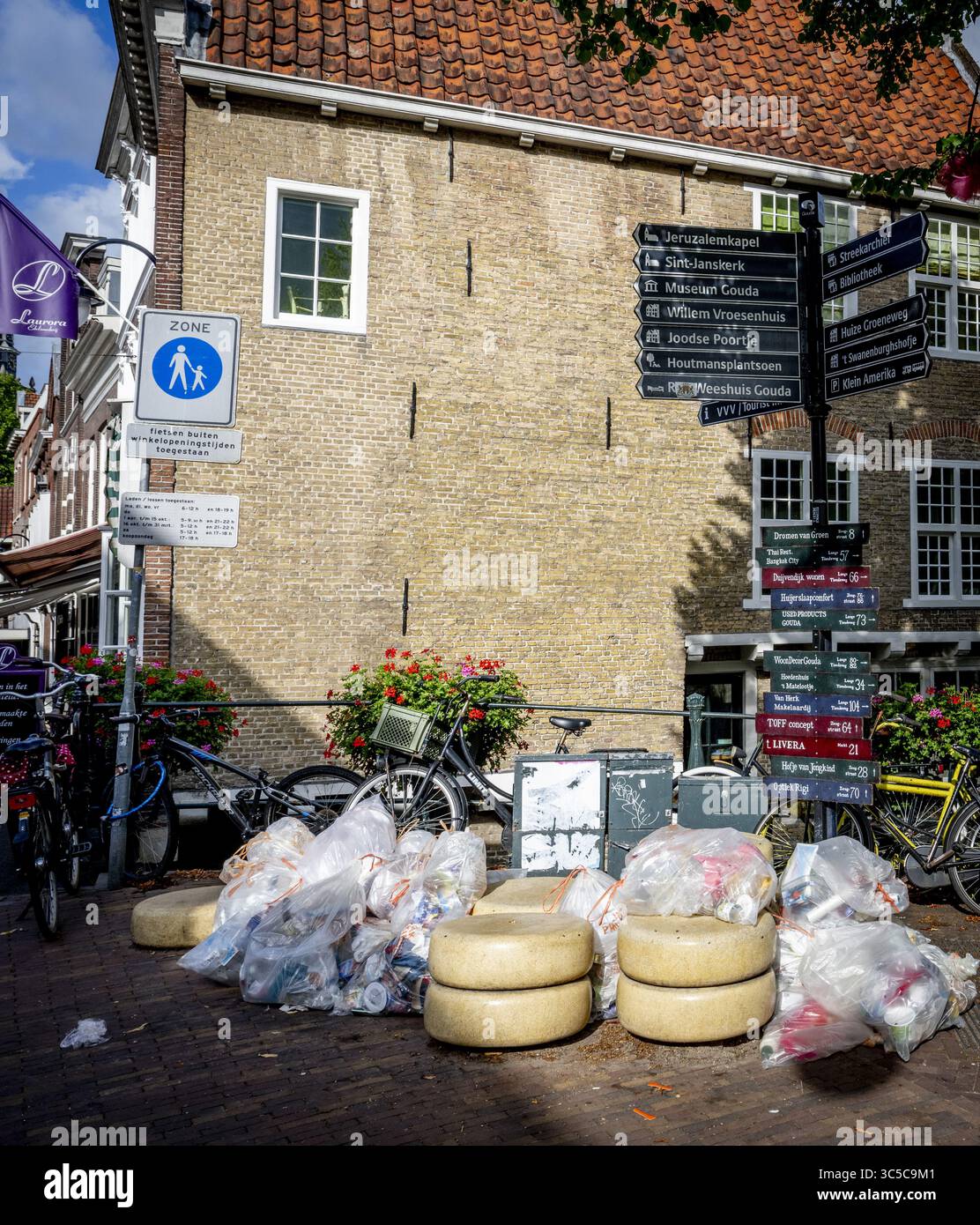 GOUDA - Garbage bags in a residential area with separated trash in ...