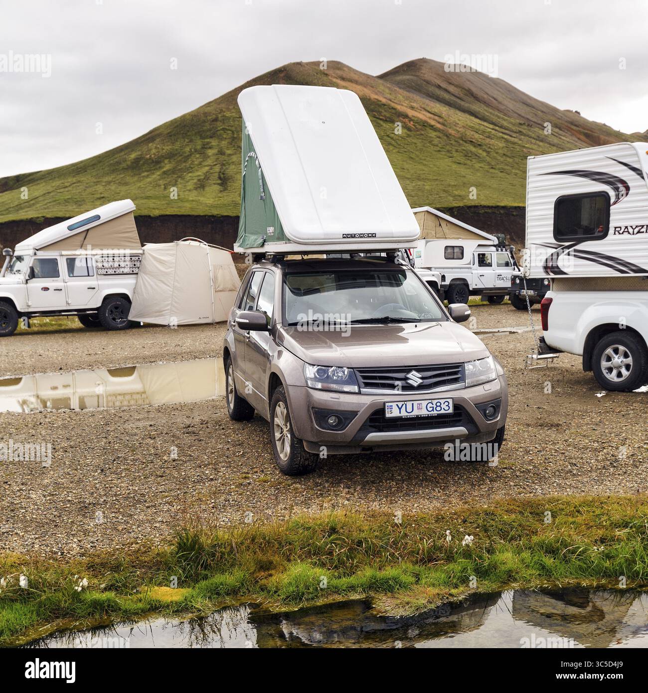Off-road vehicle, SUV with roof tent, camping site in Landmannalaugar ...