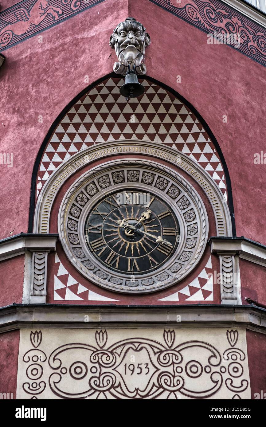 Close-up of a beautiful and ornate vintage clock with Roman numerals on ...